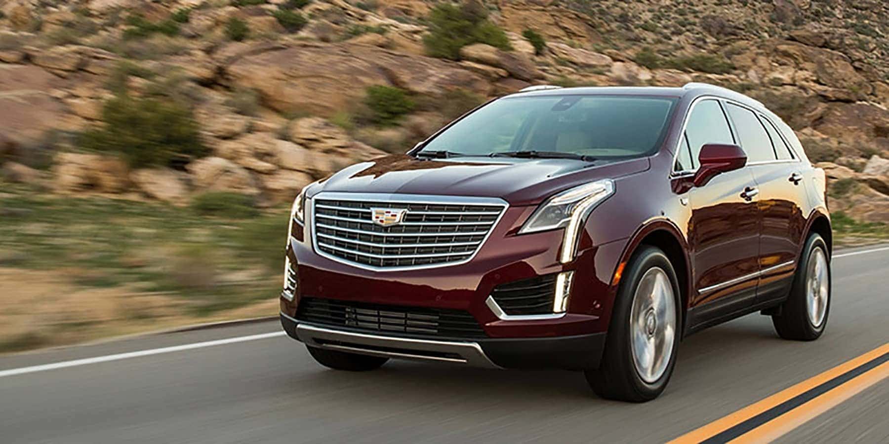 2017-xt5-exterior-gallery-highway-twilight-1280x400 | Eddy's Chevrolet Cadillac